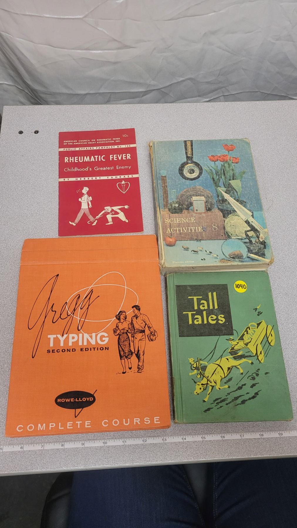 Four antique books - 1950's typing book, science activities, Tall Tales ...