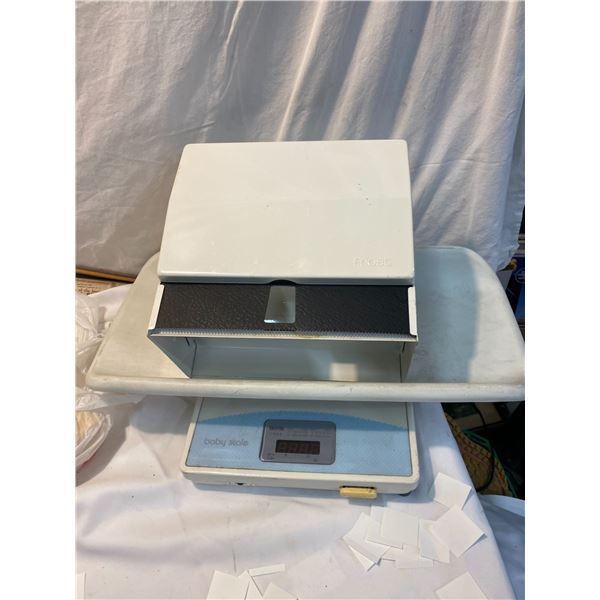Baby scale and paper towel dispenser
