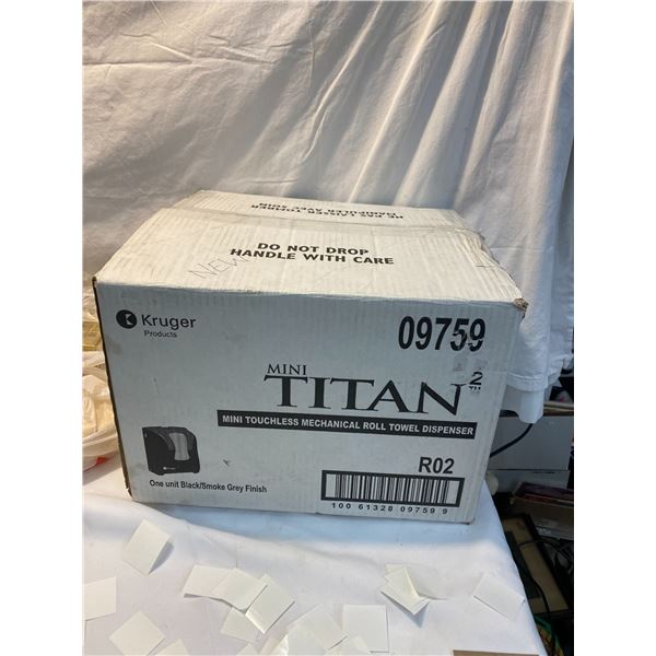 New Titan touch less paper towel dispenser