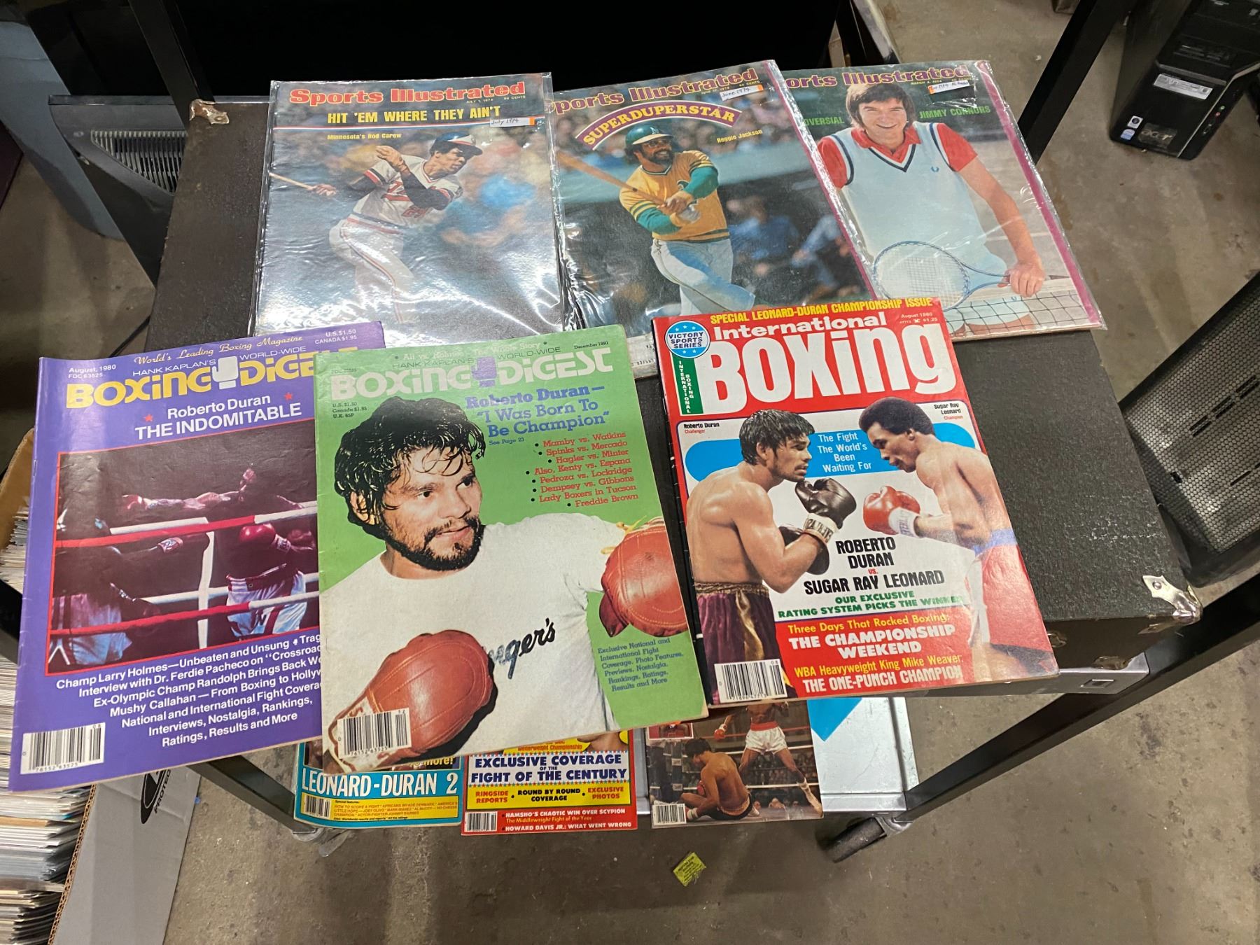 Sports illustrated and boxing magazines