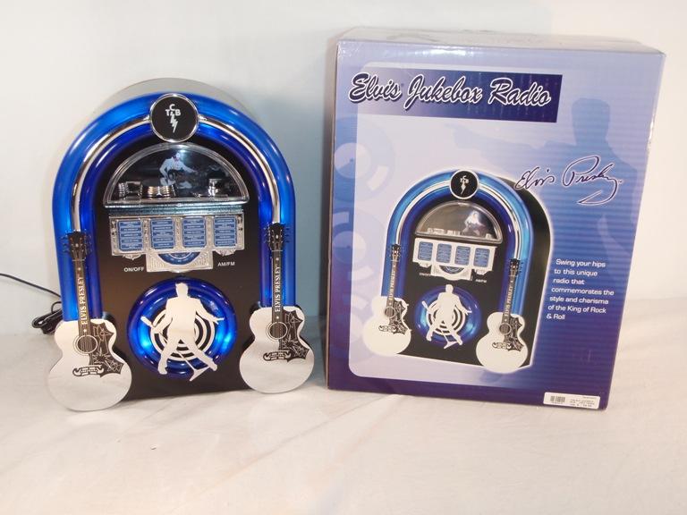 Elvis Light up Juke box AM/FM Radio 11 in tall