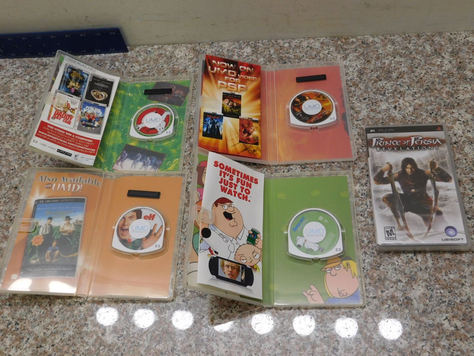 Lot of 5 PSP Games Movies Elf Family Guy Ghostbusters UMD Disks