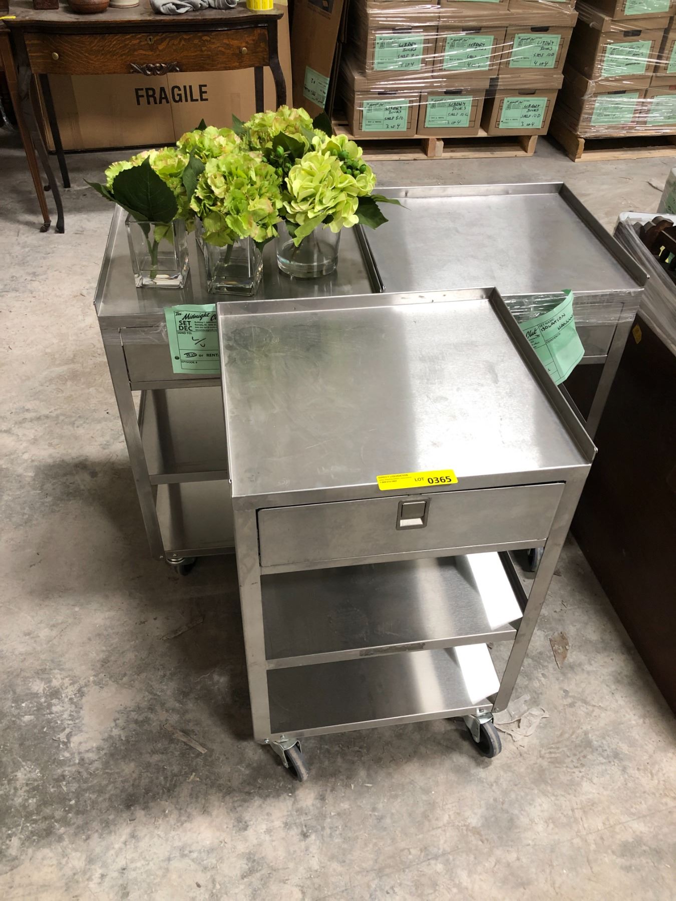 3 stainless mobile utility carts w/ drawers & 5 plant decorations