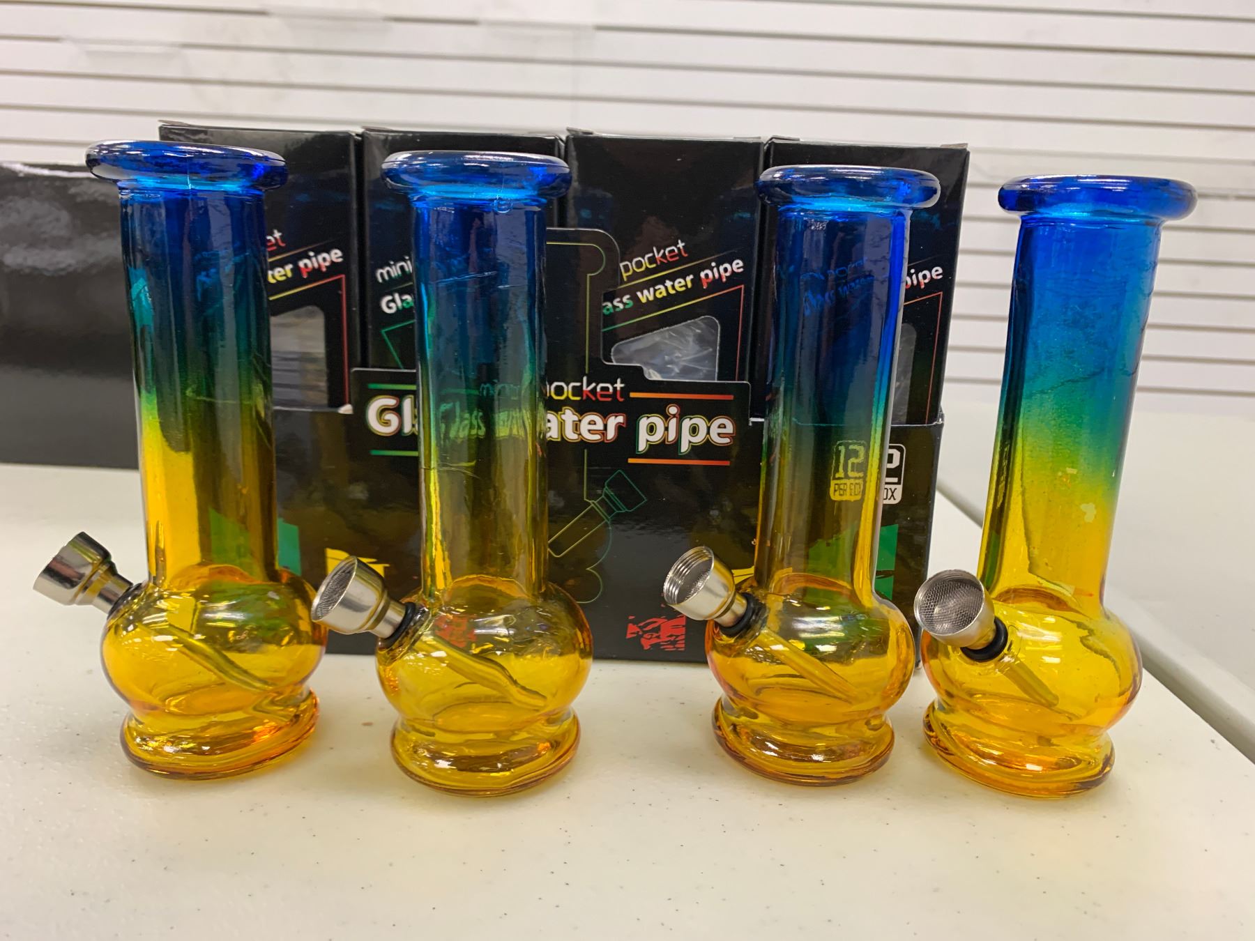 Box of 12 new mini pocket glass water pipes/bongs (new in individual packs)