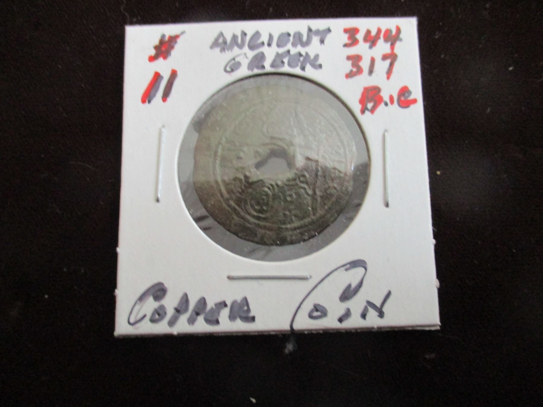 ANCIENT GREEK 344 - 317 BC COPPER COIN