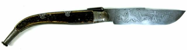 Large knife with etched blade marked Toledo