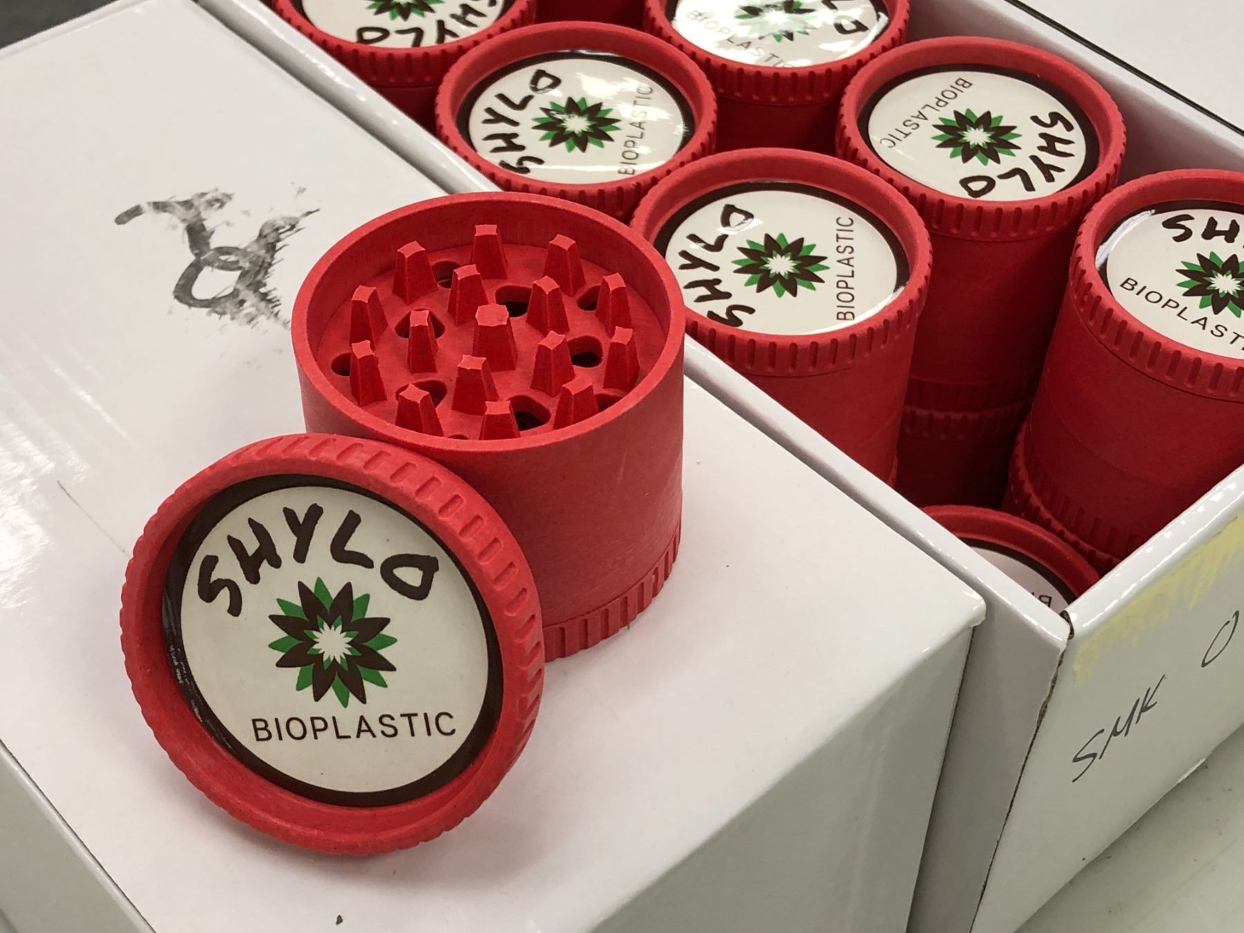 Group of Approx. 60 Bioplastic Red Grinders