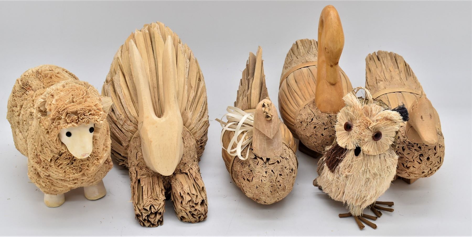 Hand Carved Wood, Husk, and Reed Animals