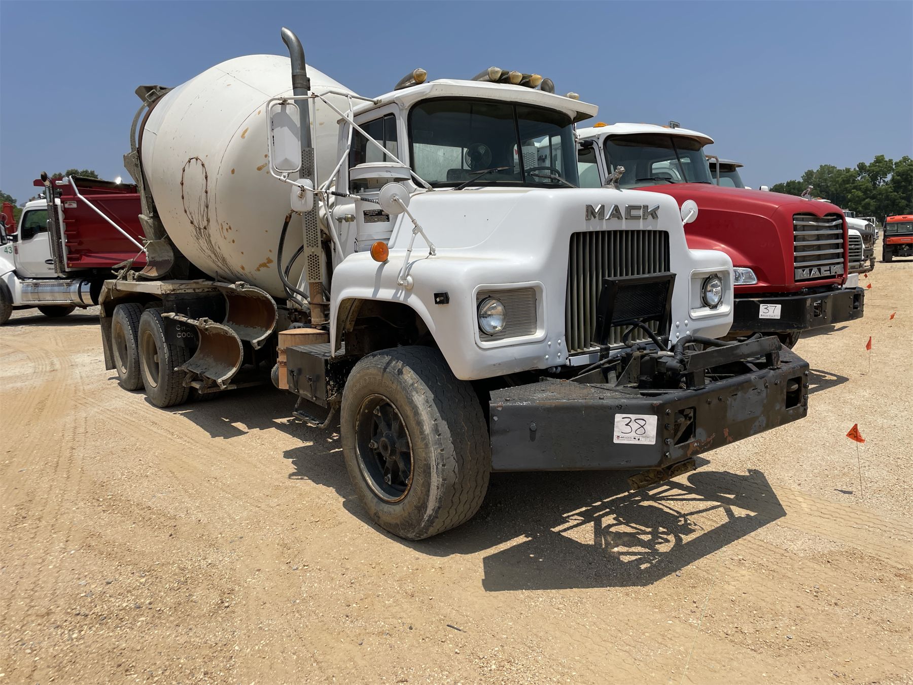 1984 MACK DM685S Concrete Mixer / Pump Truck - J.M. Wood Auction Company, Inc.