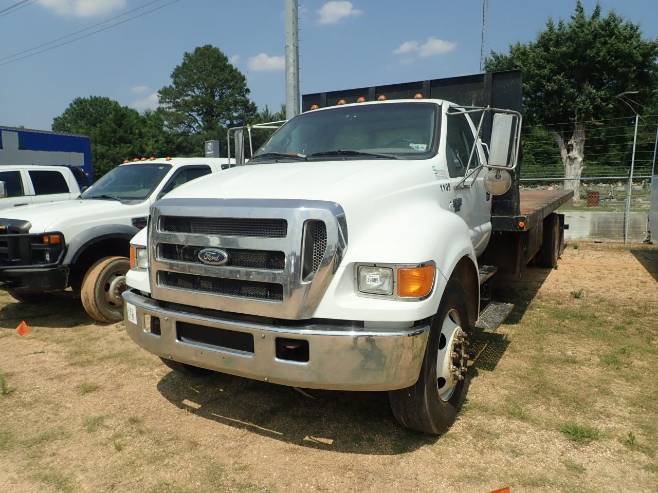 2005 FORD F650 XL Flatbed Truck - J.M. Wood Auction Company, Inc.