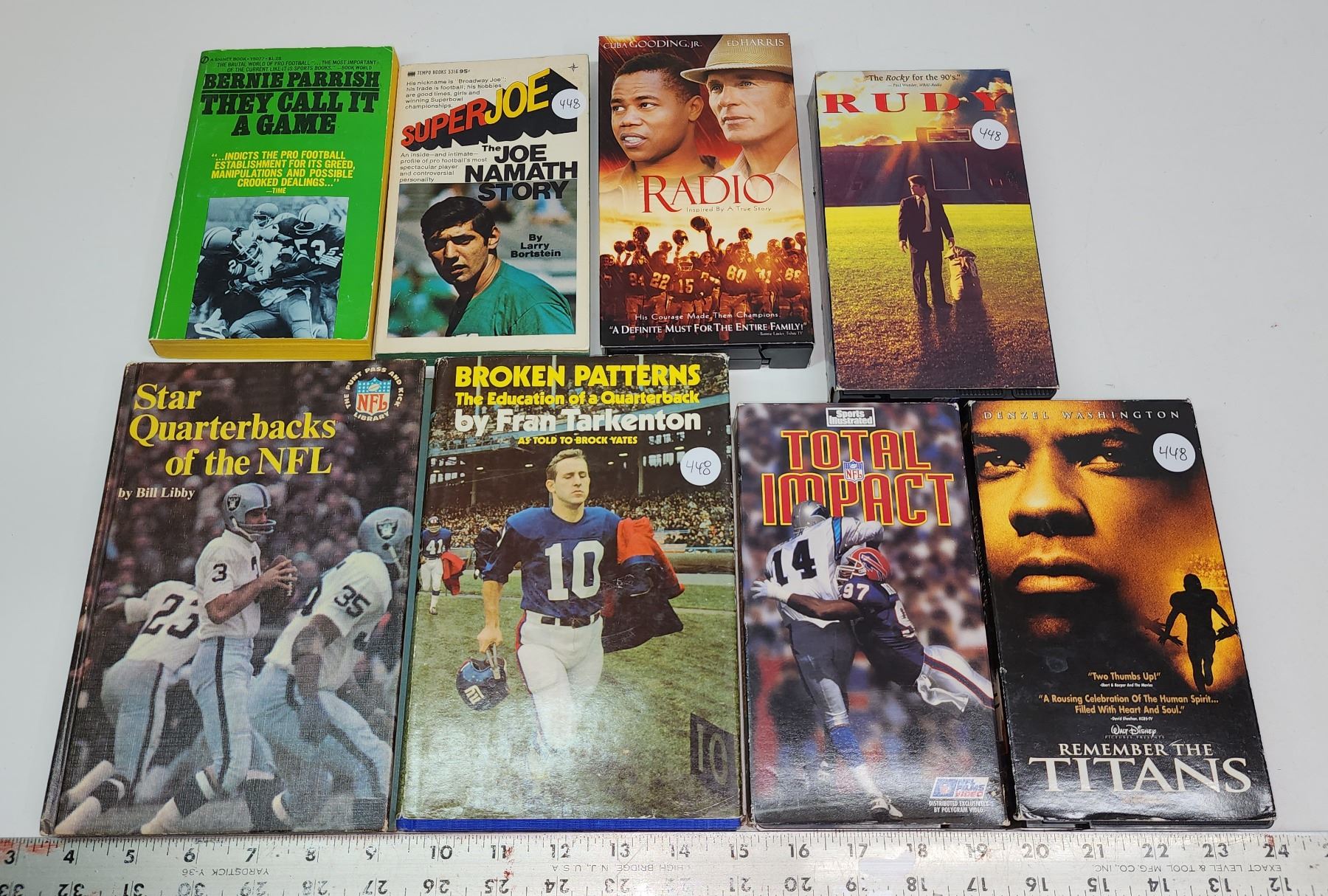 4 Football VHS Movies, 4 Football Books - Schmalz Auctions