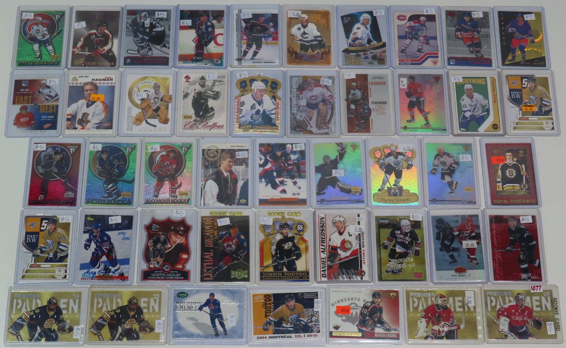 45 assorted hockey cards - in plastic holders (Includes a signed Greg ...