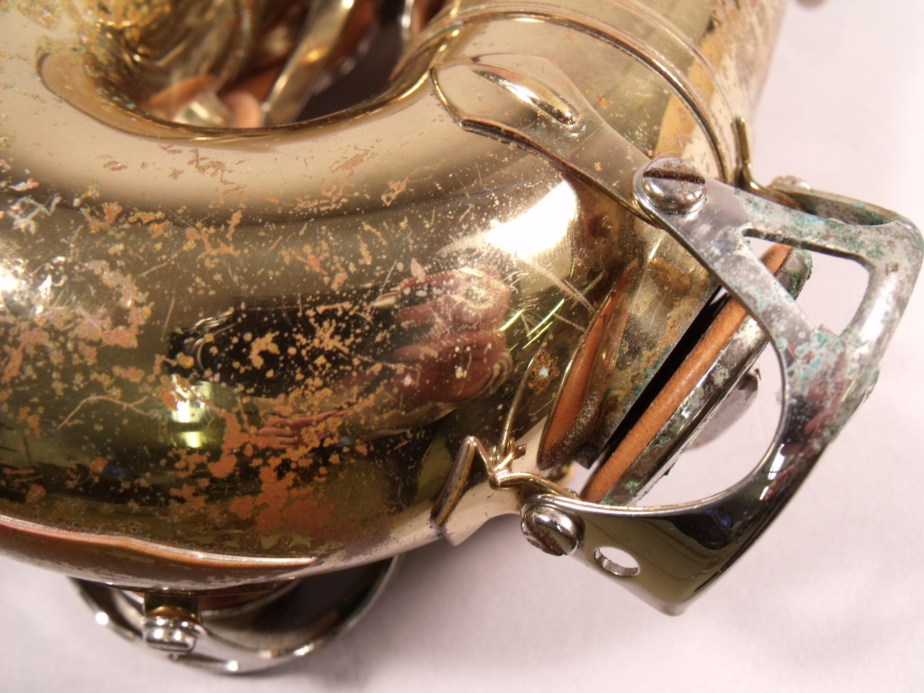 A Selmer Bundy II Brass and Chrome Alto Saxophone.