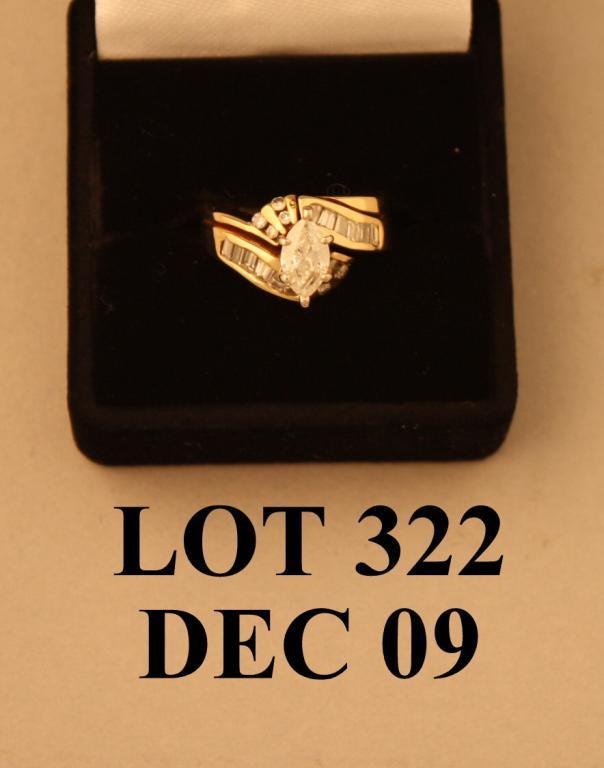 Diamond ring. Approx. 60-point marquis cut diamond with approx. 60 ...