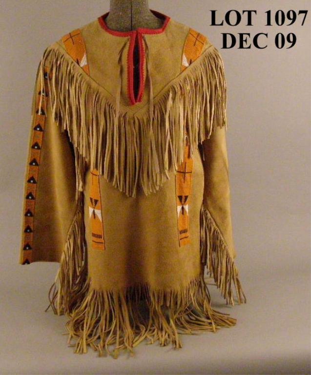 High quality, studio-made buckskin shirt with long fringe and simulated ...