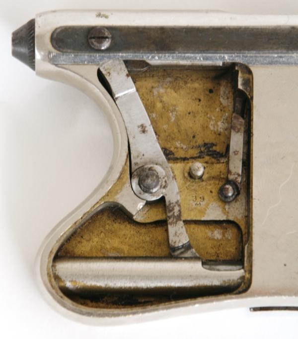 Nickel plated squeezer with ring trigger