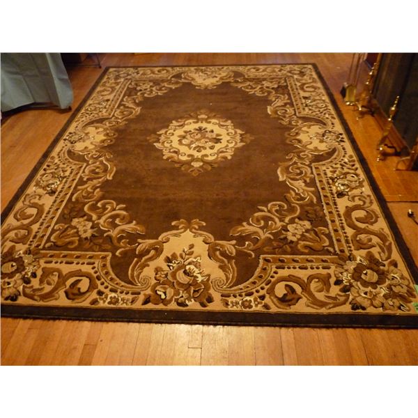 Area rug approximately 123 inches by 94 inches