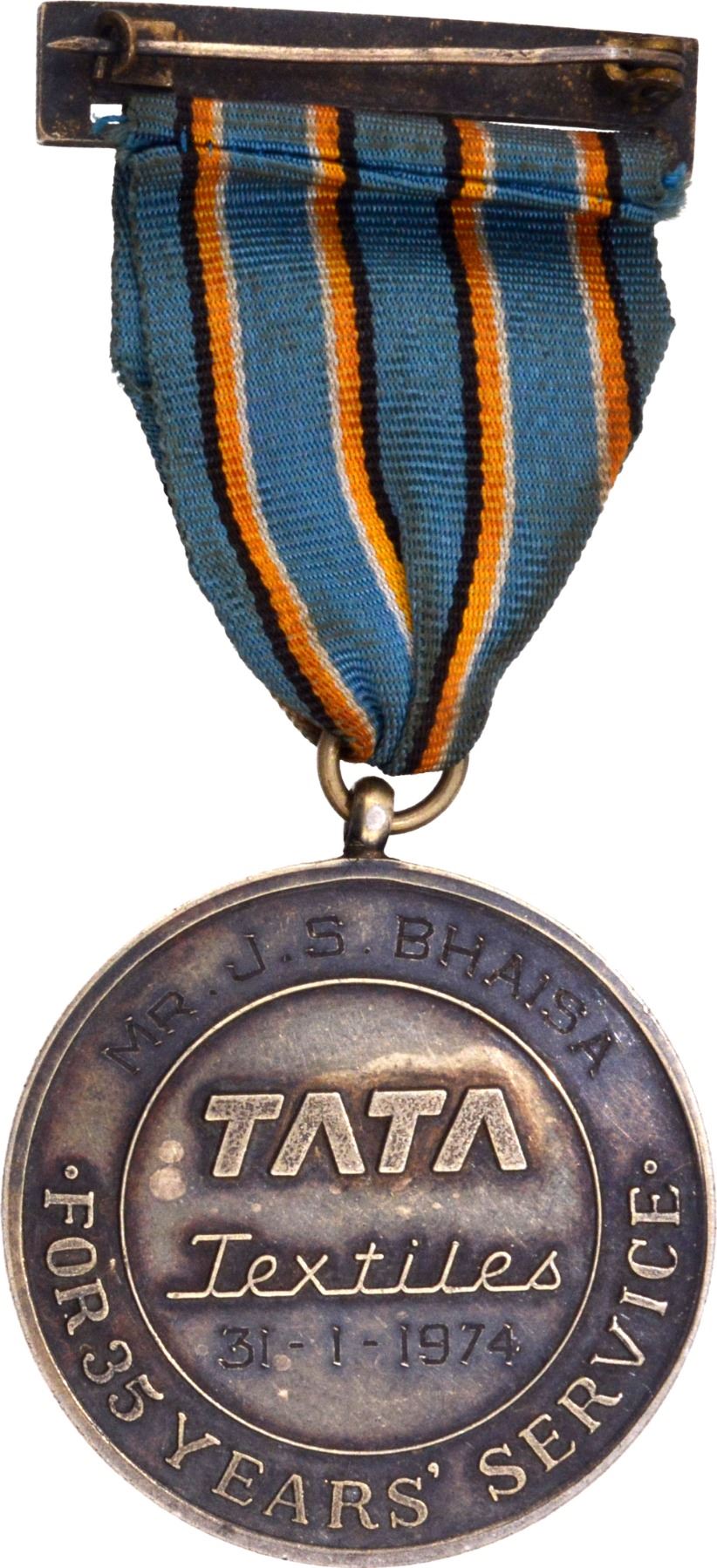 Silver Medal of 35 Years Service of Tata Textiles of 1974.