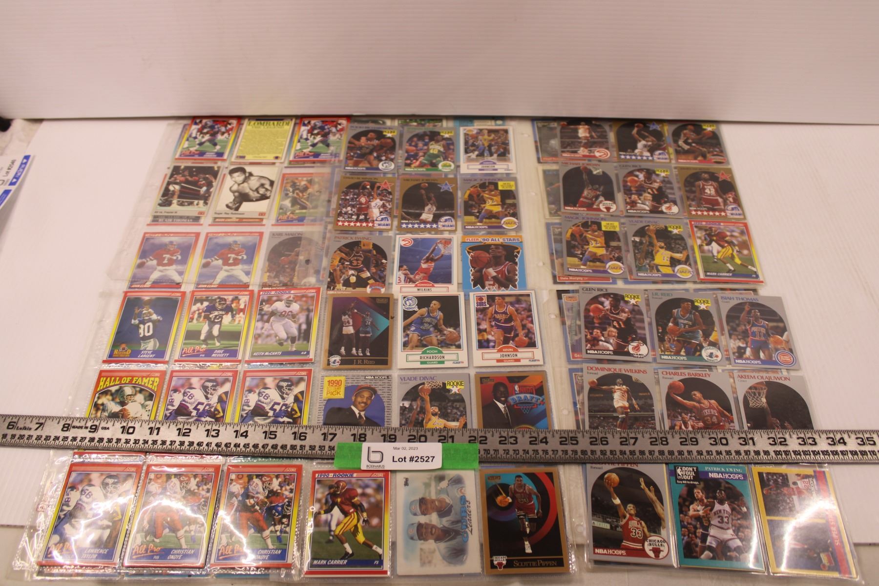 (12) Sleeves Of Assorted Sports Cards