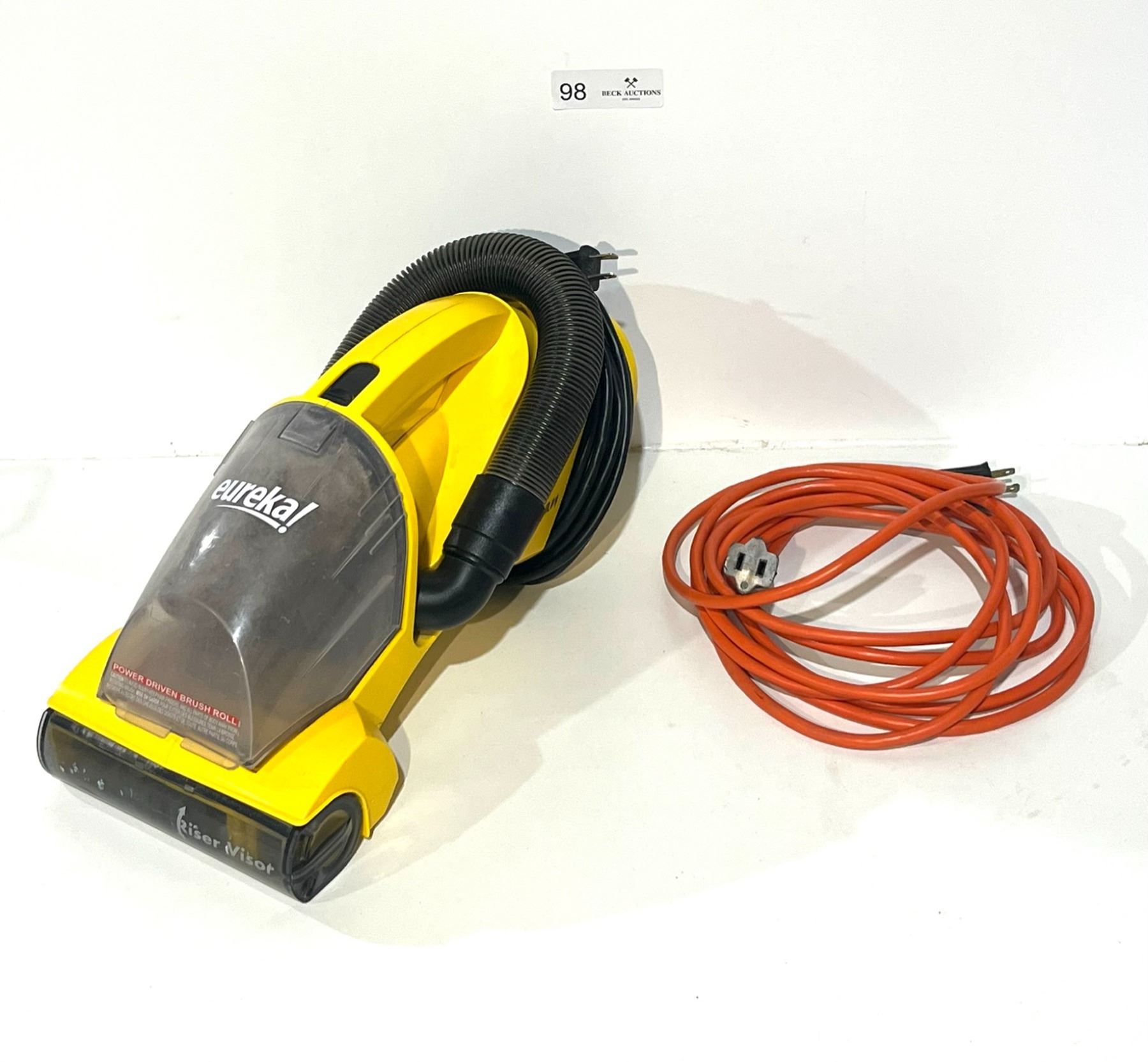 Eureka! Hand Held Plug-In Vacuum and Extension Cord - Beck Auctions Inc.
