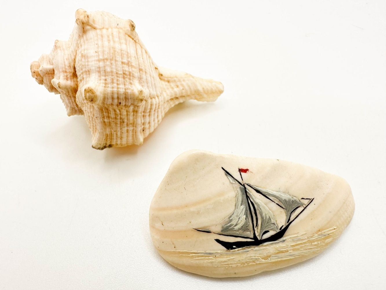 SHELL AND SHIP BROOCHES