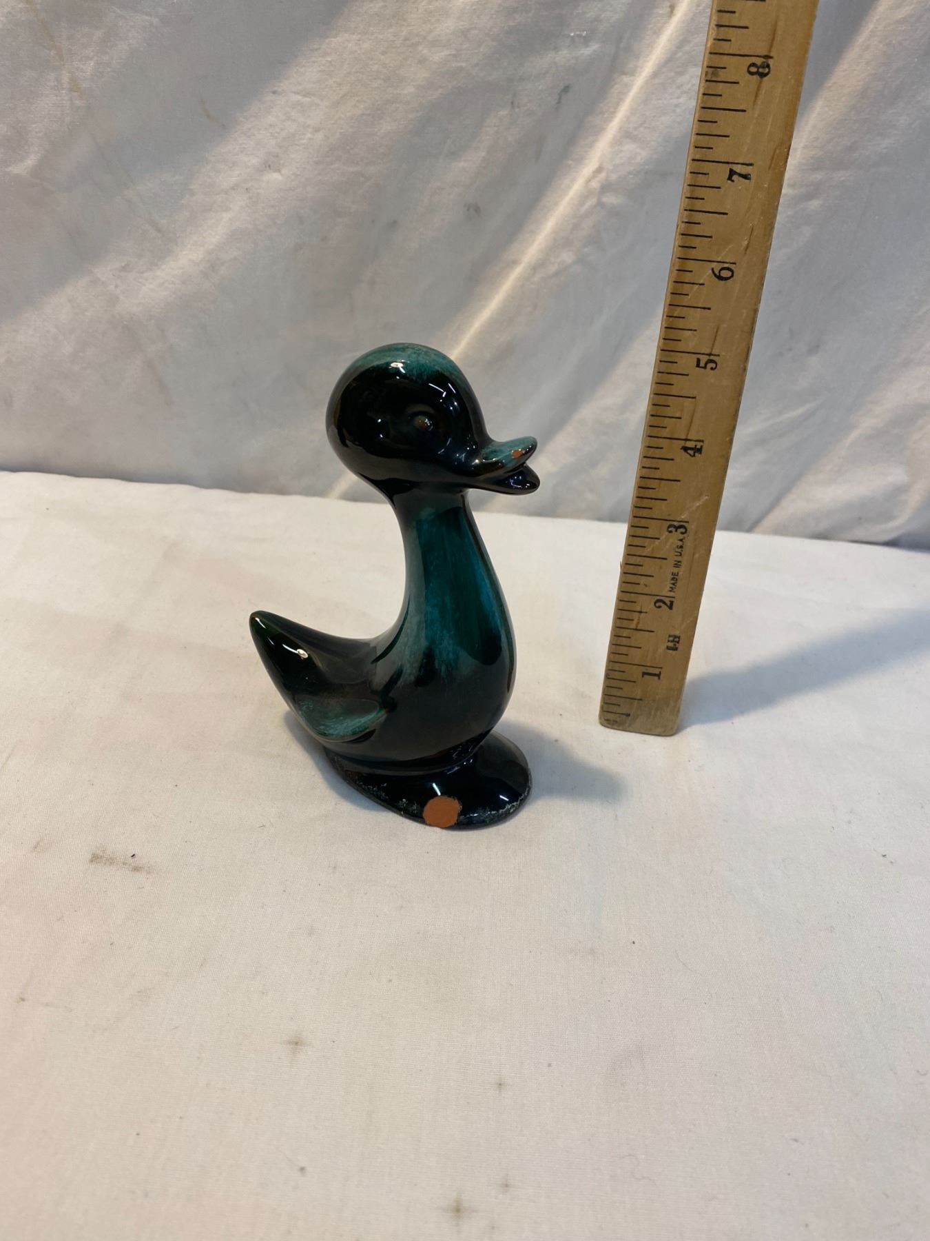 Duck pottery chipped
