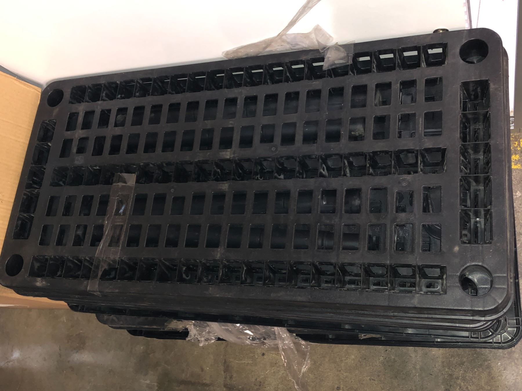 Large group of plastic shelving racks