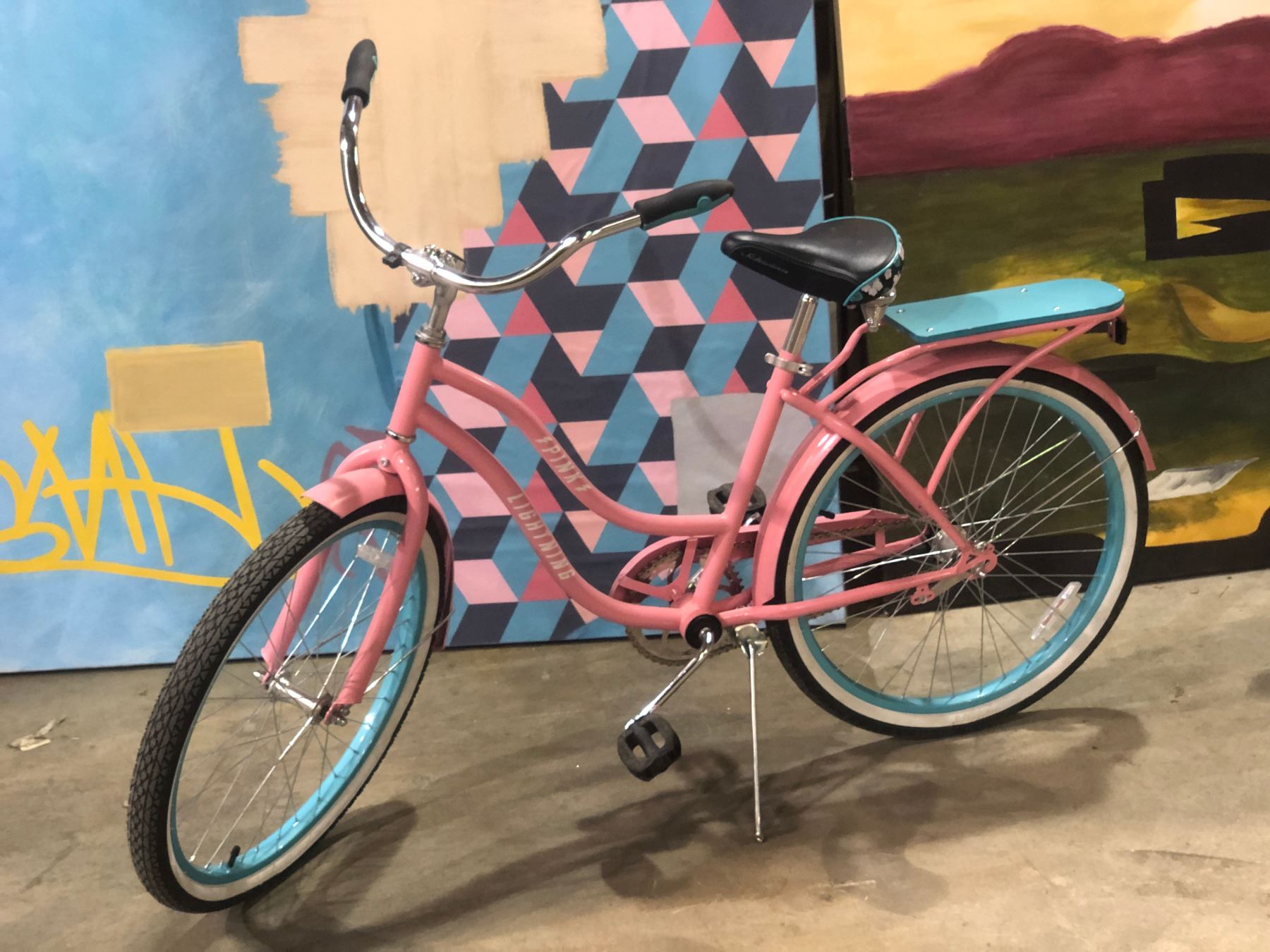 Lady's Schwinn pink and blue bicycle