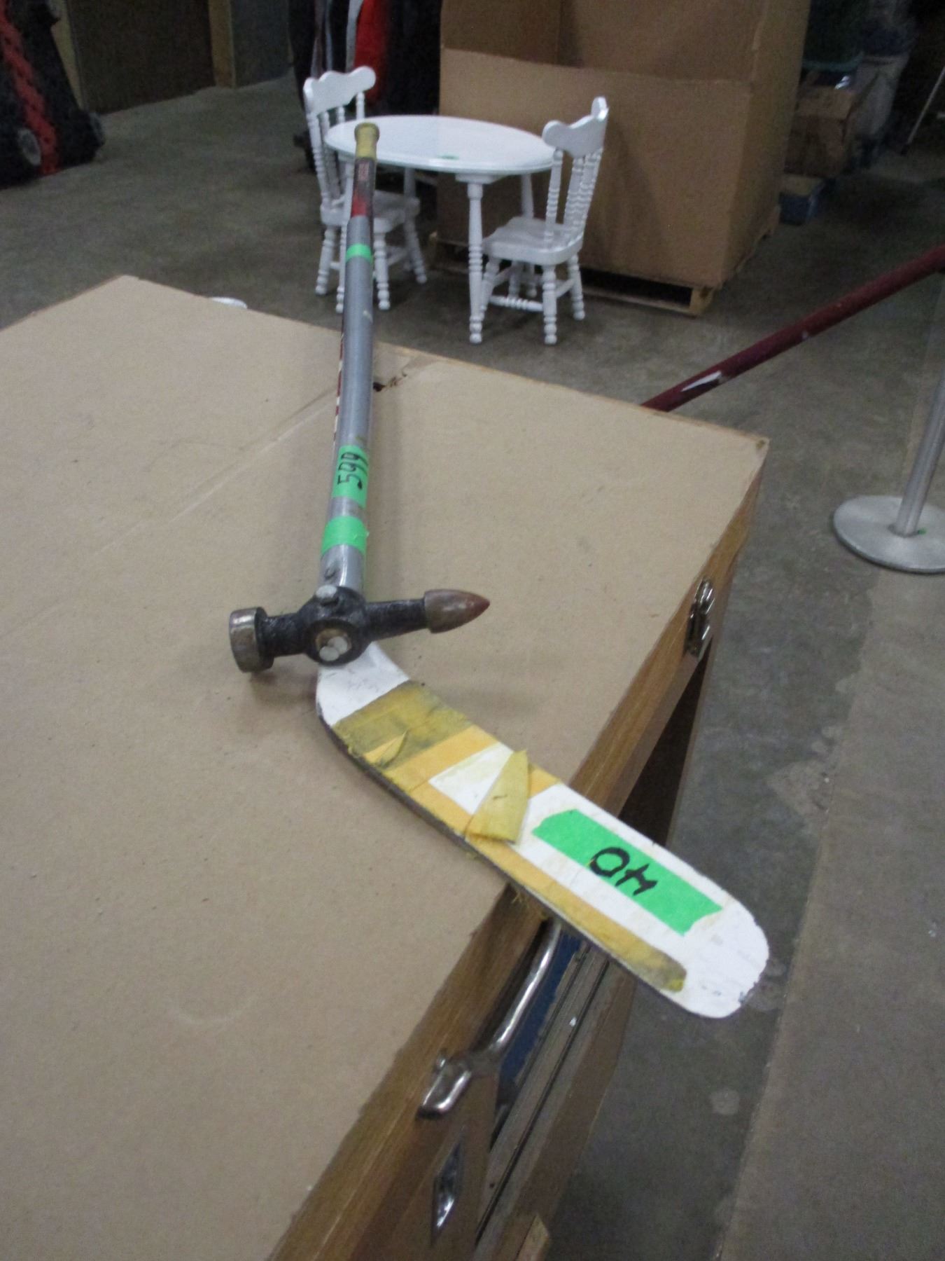 UNCLAIMED STORAGE: HOCKEY STICK & HAMMER