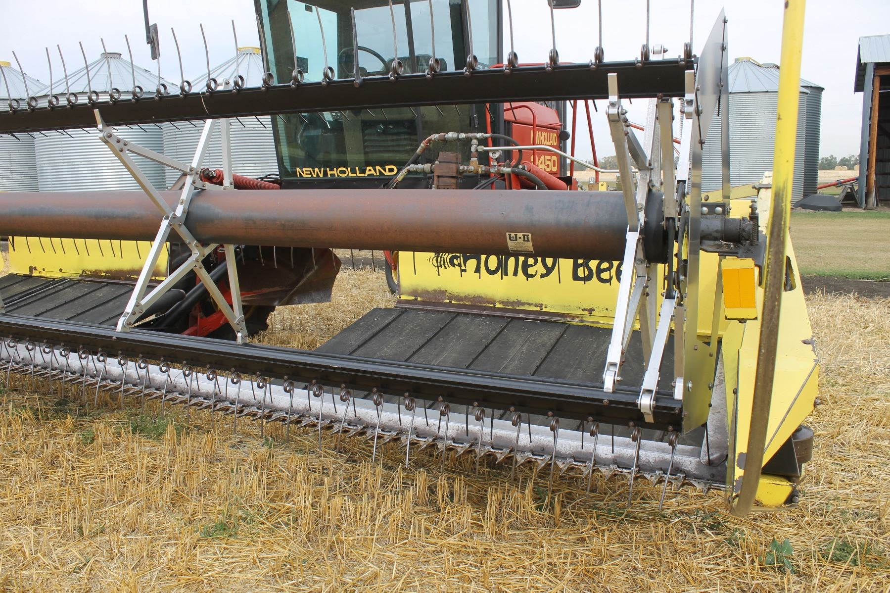 1999 New Holland 2450 Swather. Honeybee 18' Header, U2 Pickup Reels ...