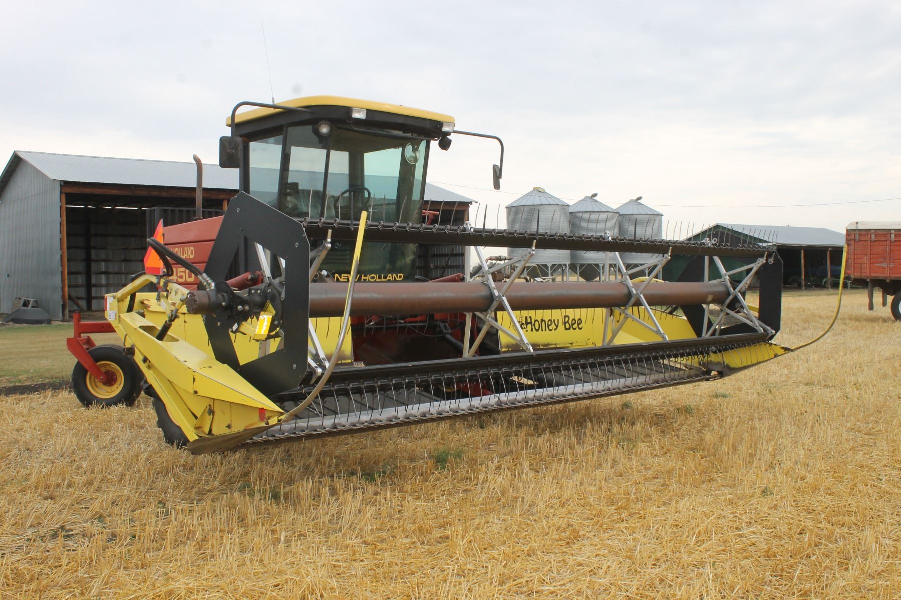 1999 New Holland 2450 Swather. Honeybee 18' Header, U2 Pickup Reels ...