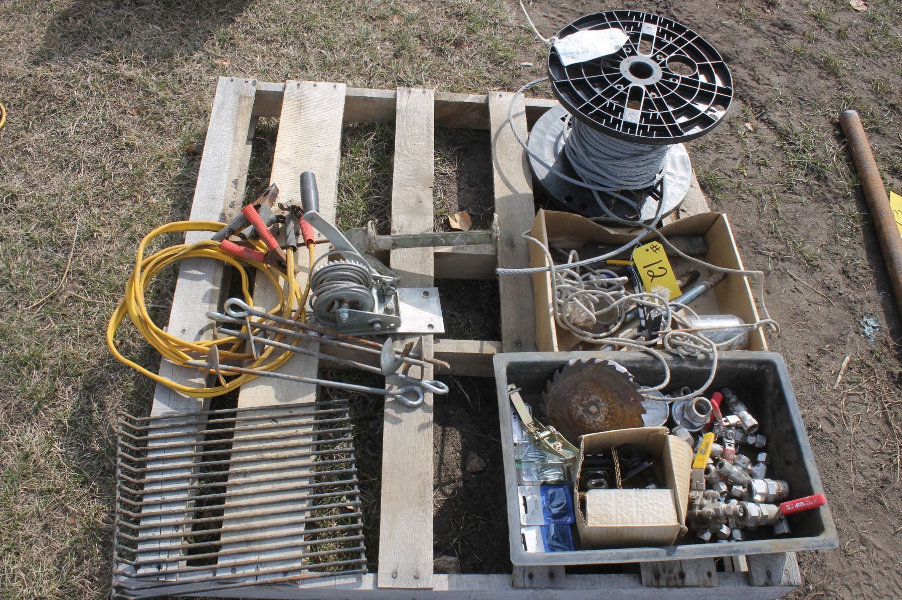 Pallet of valves, spool of cable, winch and booster cables