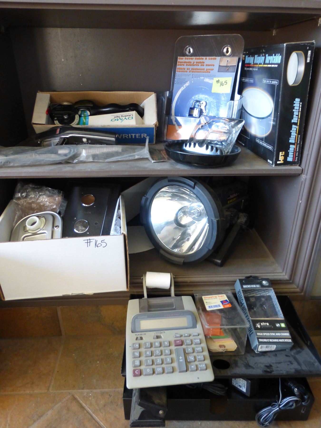 Die cast rotating table, calculator, flash light (no cord) label makers ...