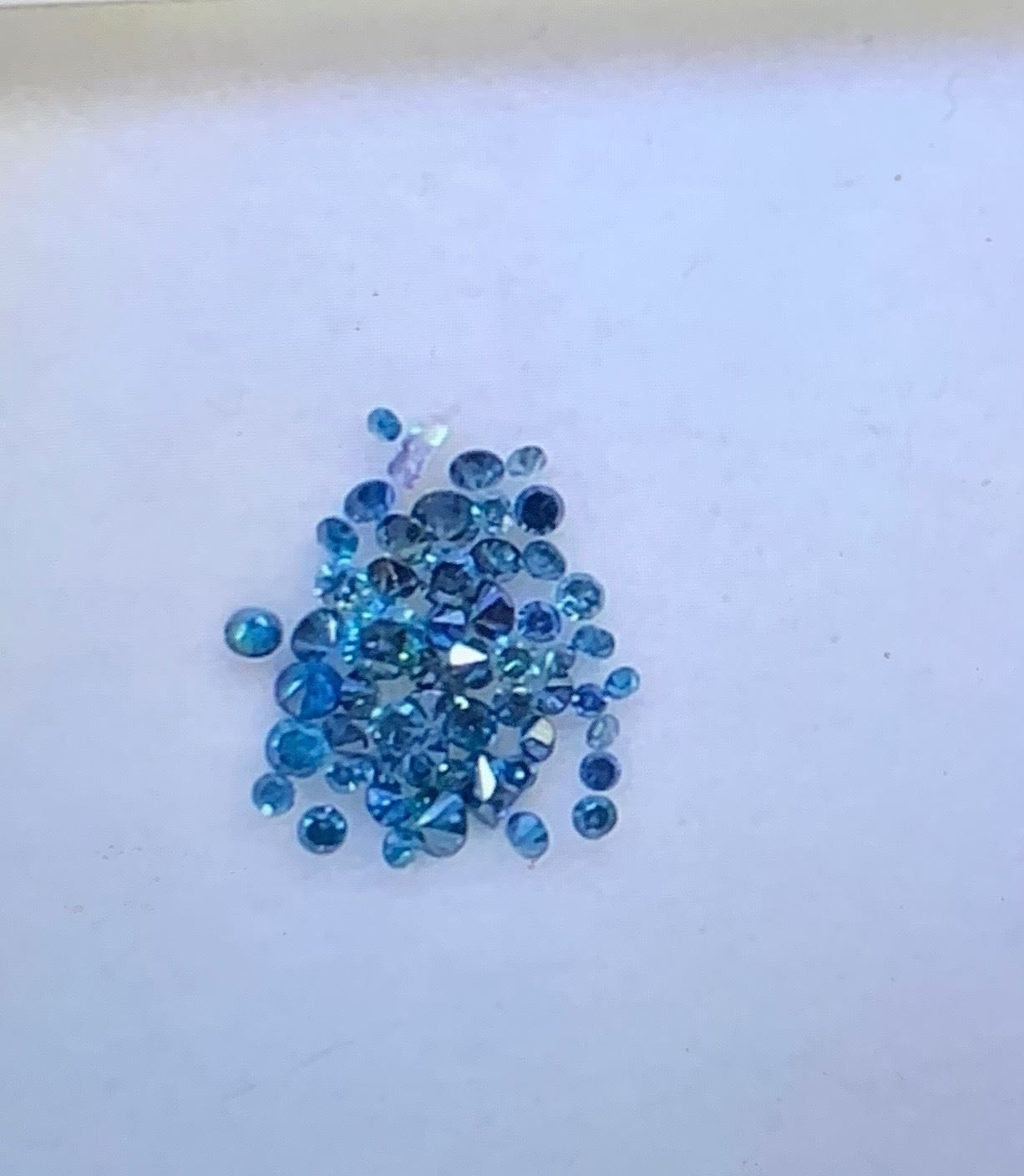 Blue Diamond ( Treated)(0.4ct) , Suggested Retail Value $400