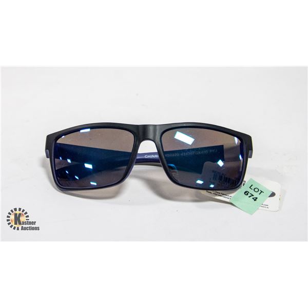 Pair Of Foster Grant Surge Sunglasses
