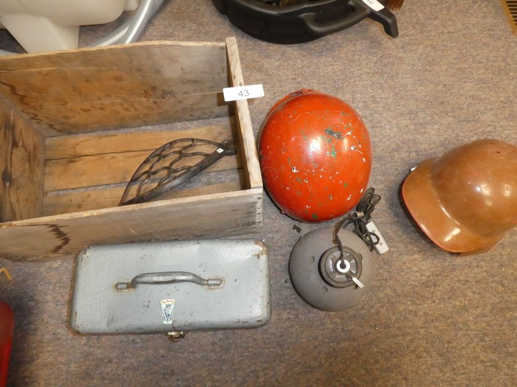 wooden crate, safety helmets, metal box