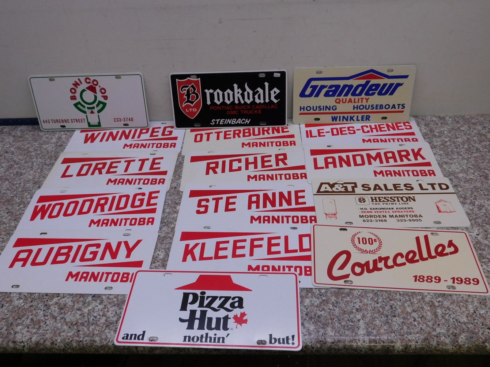 Lot of 16 Plastic Manitoba Themed / Winnipeg Business / License Plates