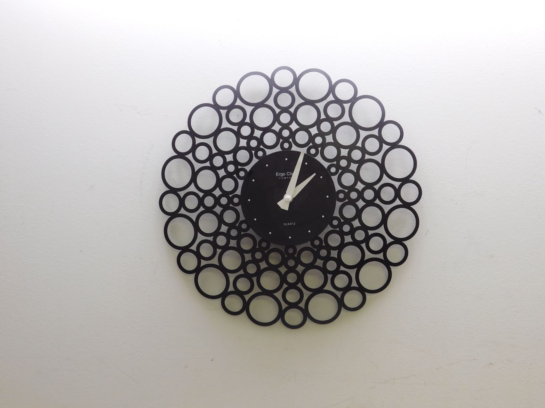 Black Plastic Circles Sunburst Wall Clock Ergo Clock Company Quartz