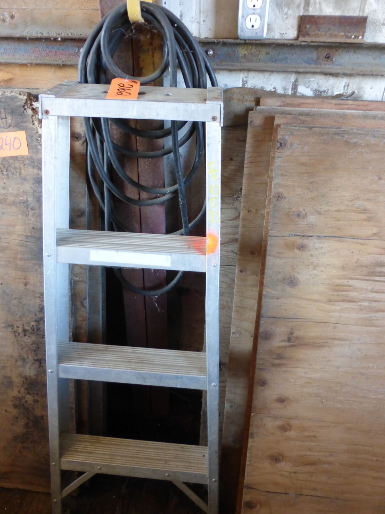 4' Allum. step ladder and roll of power cord