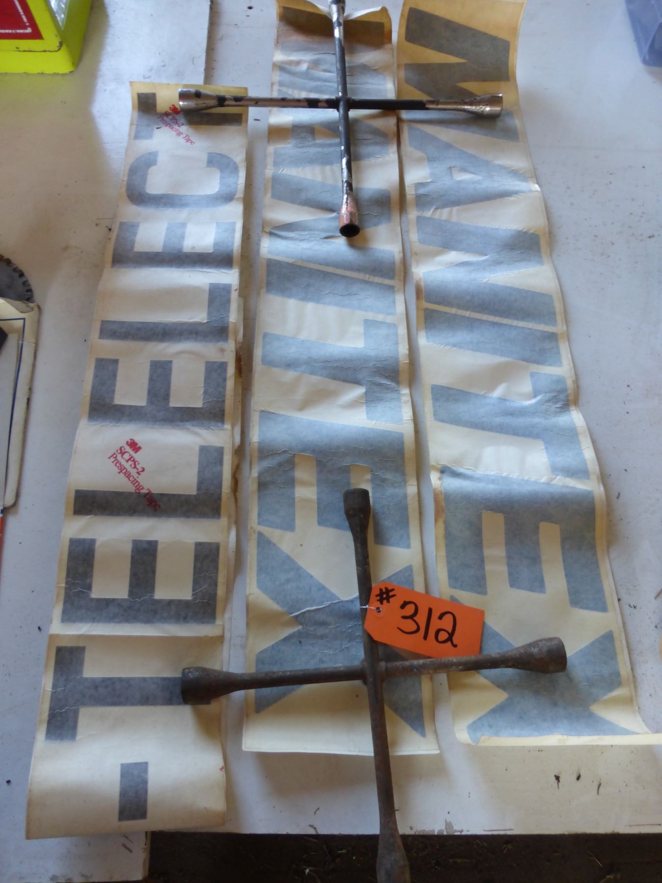 2- Tire wrenches and 3- manitex decals