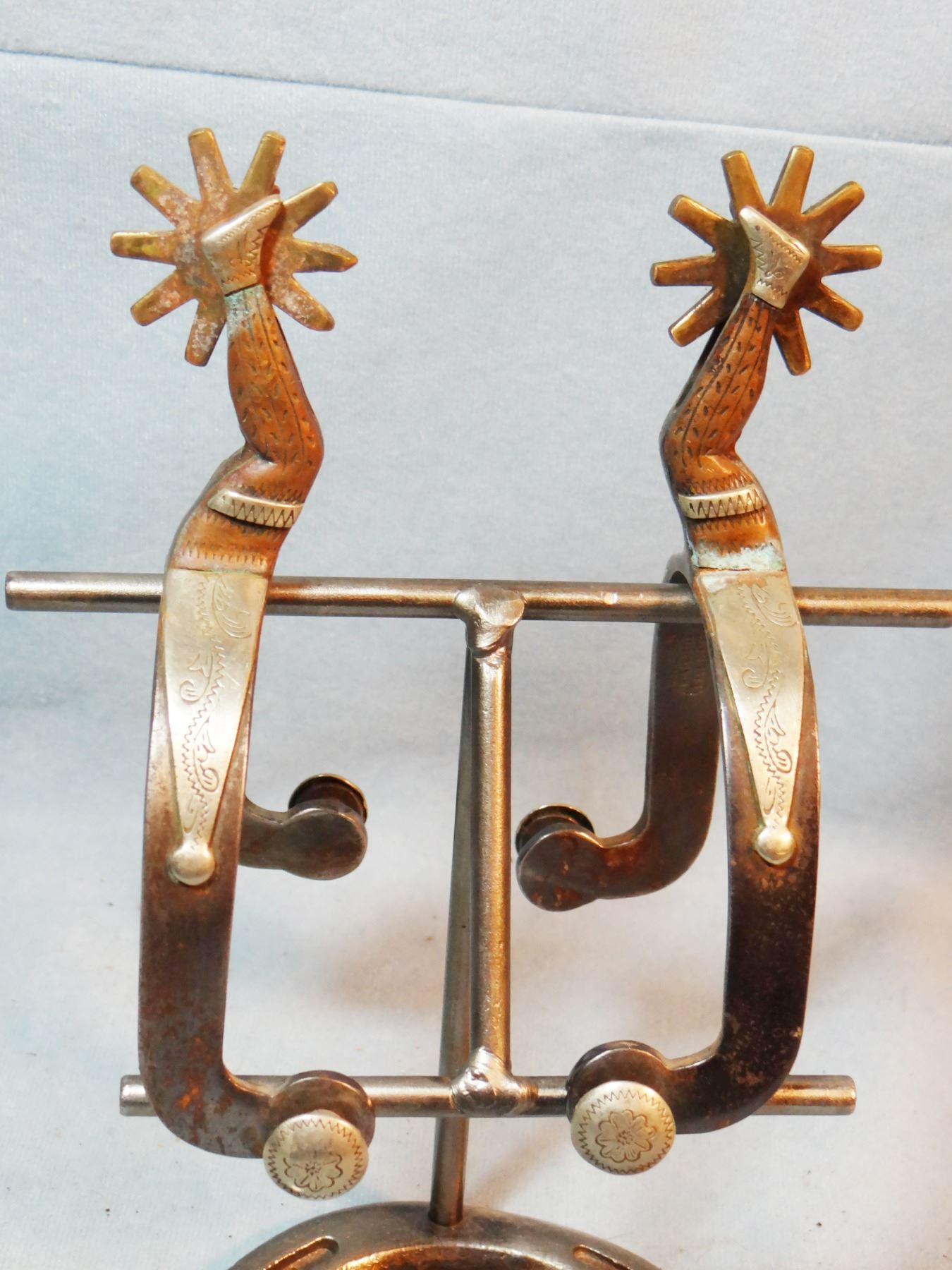 Hand forged gal leg spurs, silver and copper mtd., stamped Winchester ...