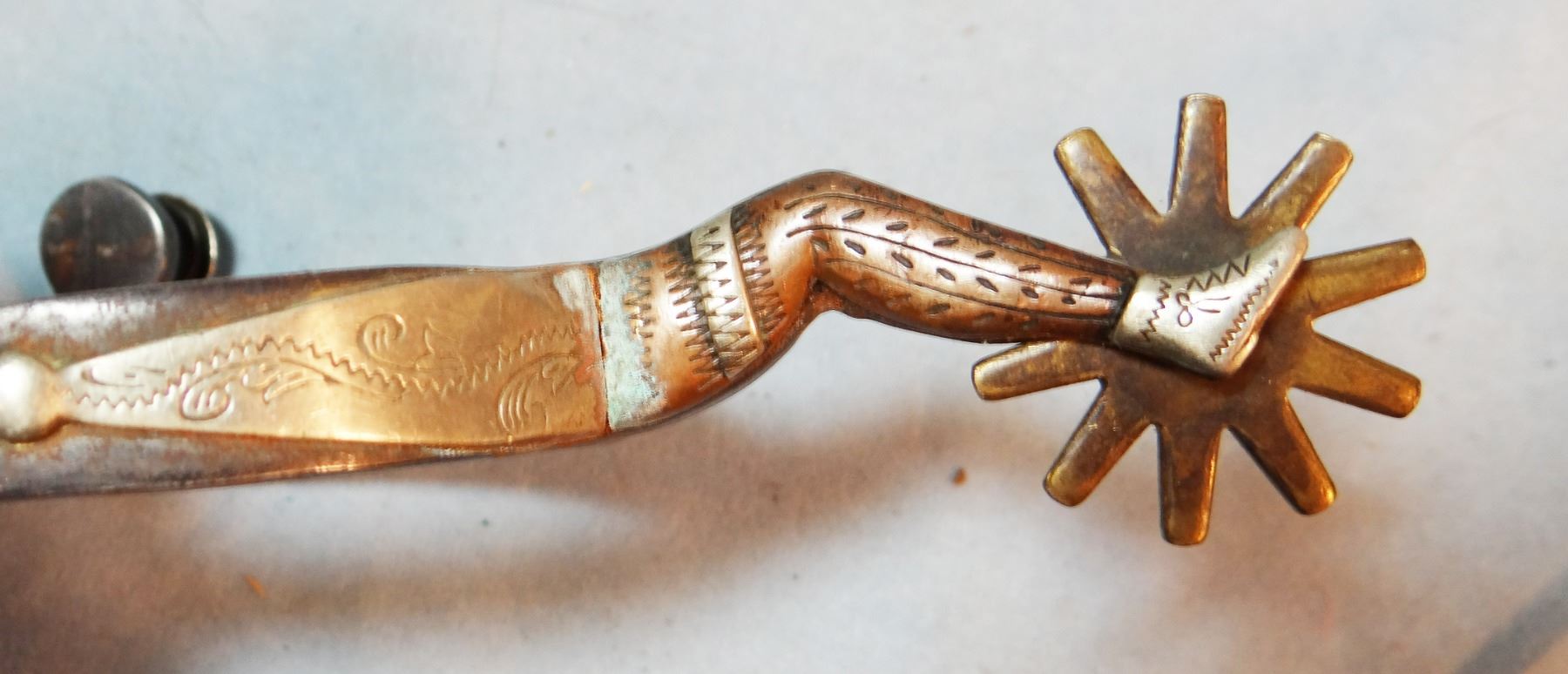 Hand forged gal leg spurs, silver and copper mtd., stamped Winchester ...