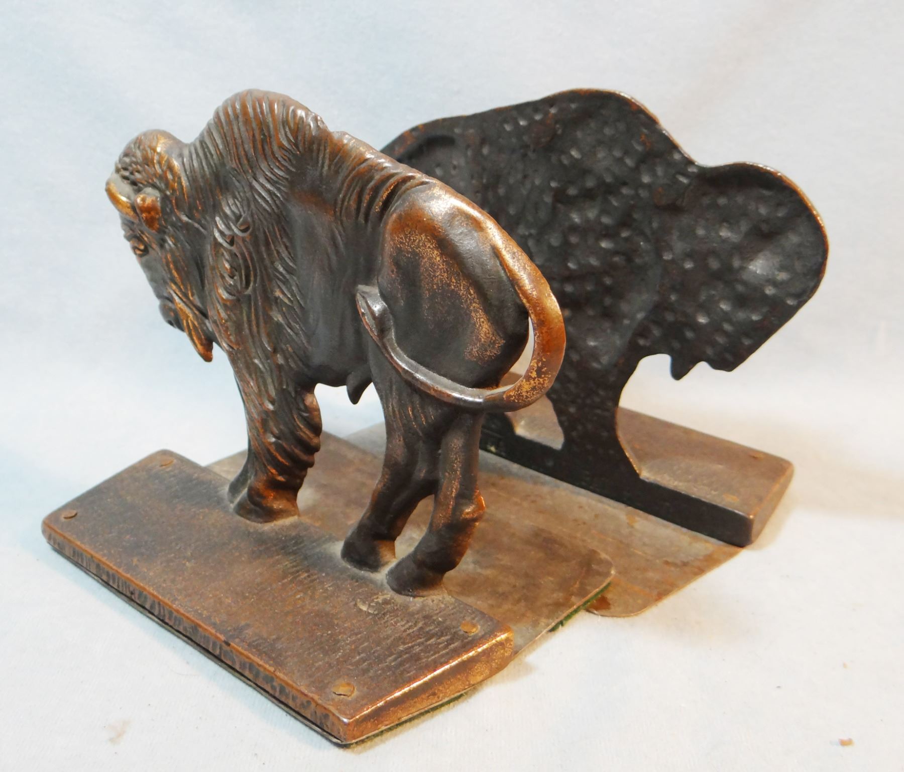 Cast iron buffalo bookends, 5 ½" x 5"