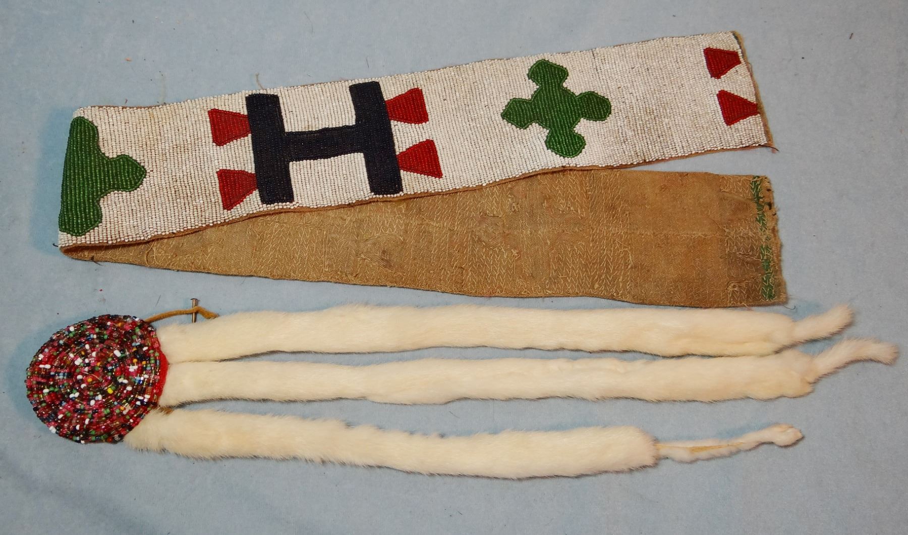 Large beaded panel, 32" x 3", 3 ermine tails and beaded medallion on ...