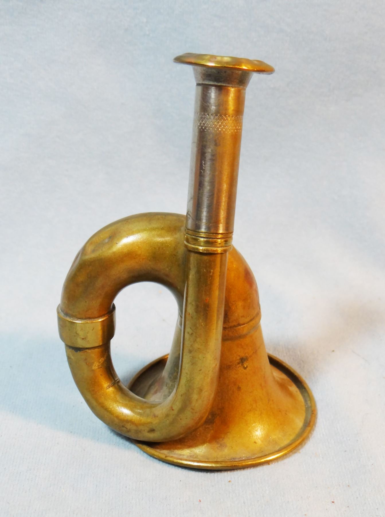 Small brass bugle/trumpet, 9 ½" long w/ Cavalry insignia embossed on ...