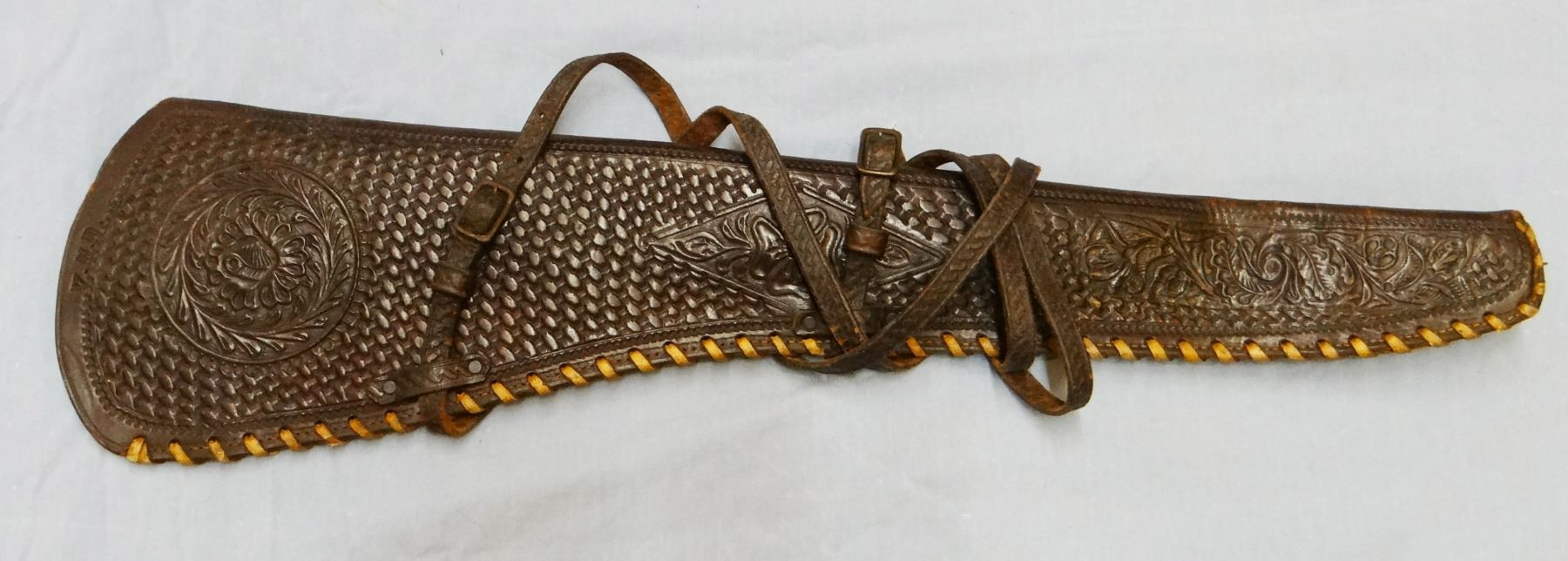 Moran Bros., Miles City fancy tooled leather 33" rifle scabbard, very rare