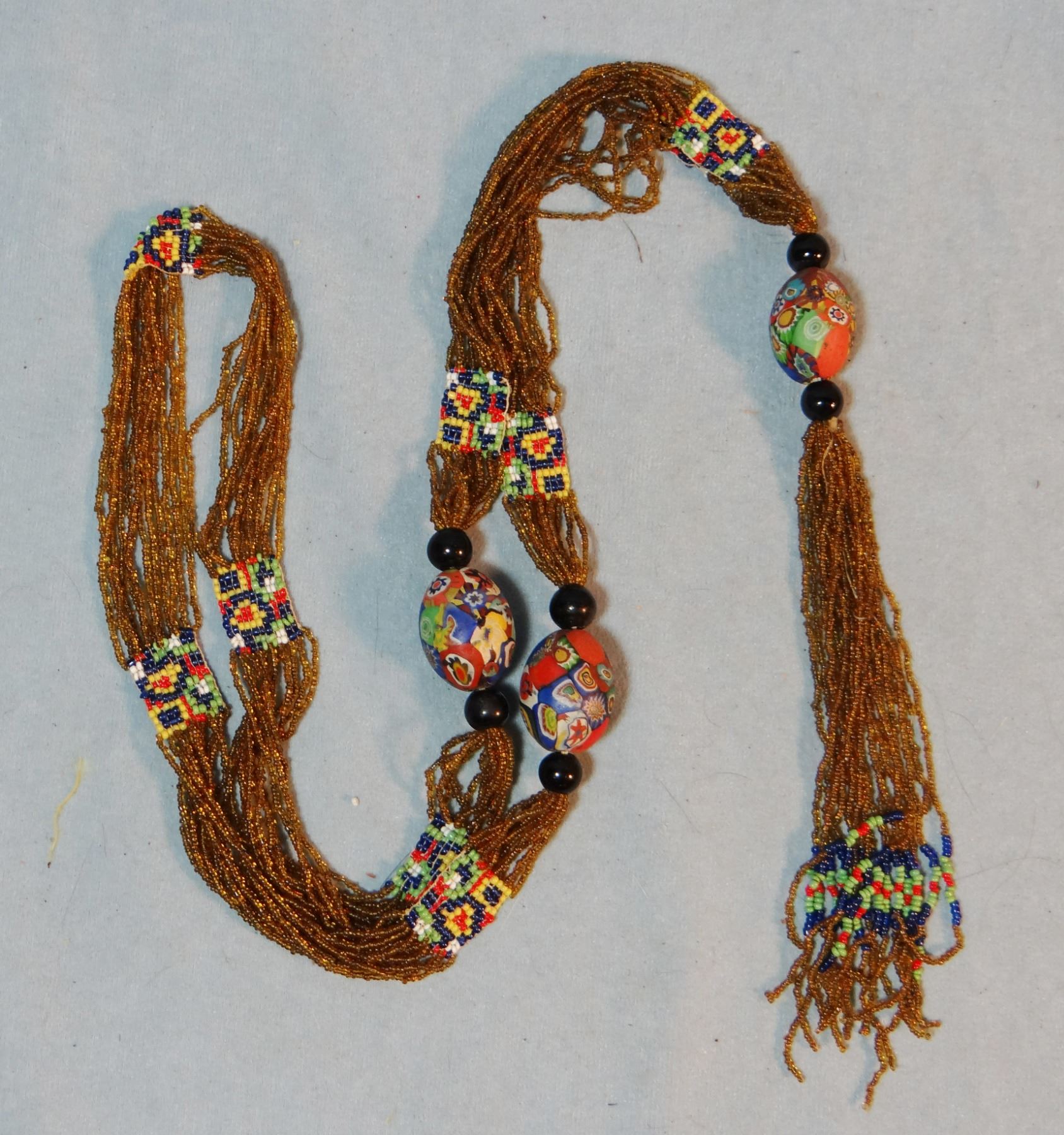 Fancy gold beaded necklace, w/large ornamental pattern beads