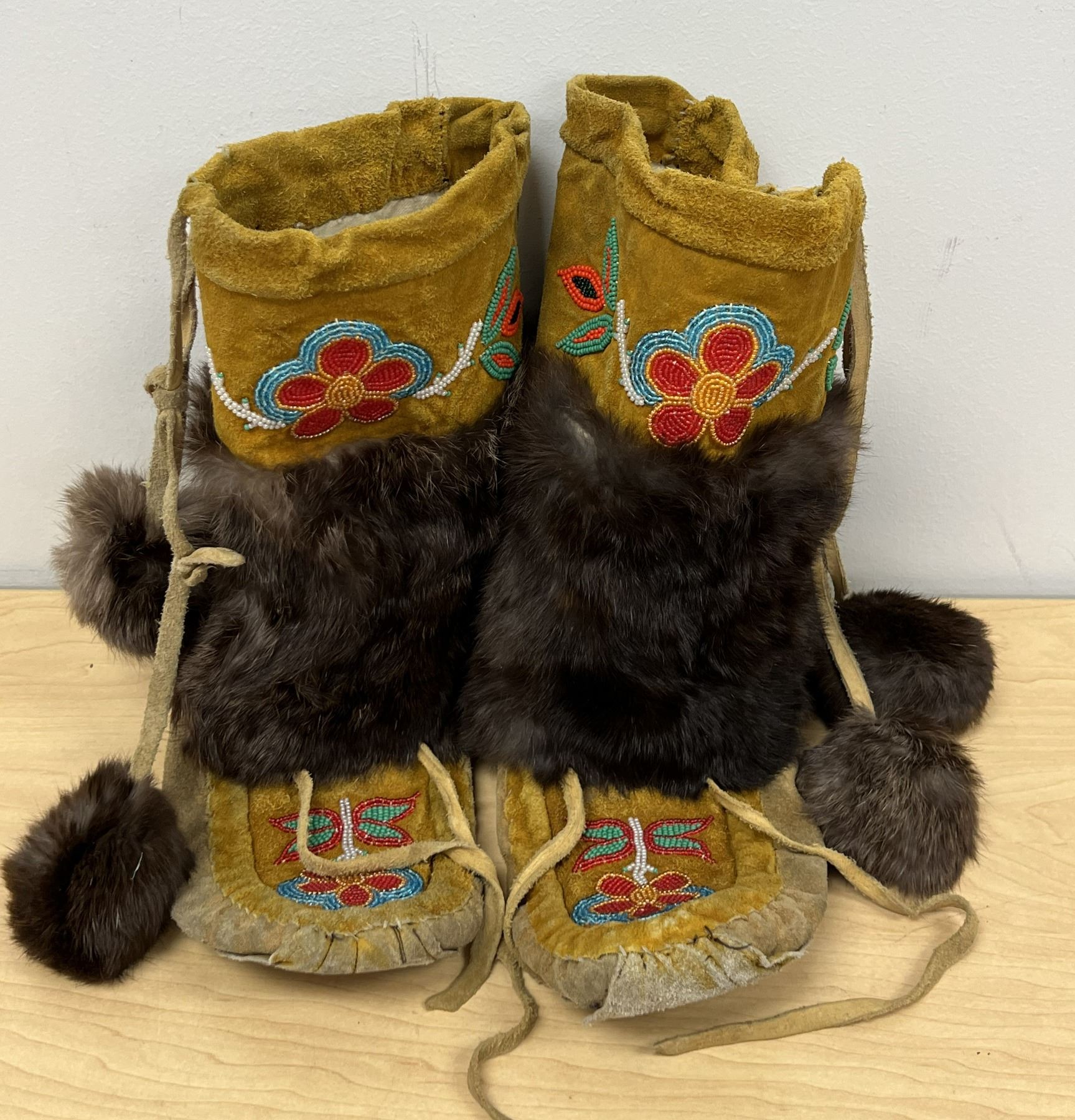 Leather Beaded Mukluks - well used; see photos. About 10.75x4" across ...