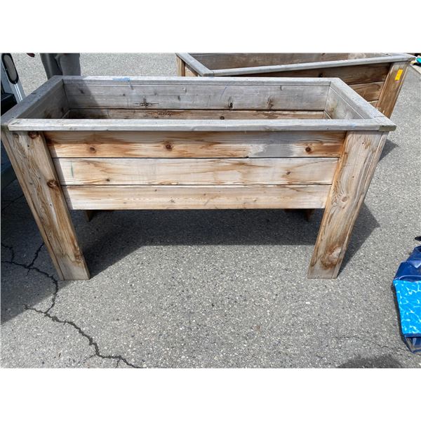 64x28 inches and aprox 36 " tall planter