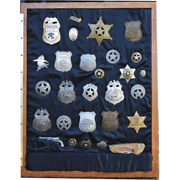 oak standing display case with 27 badges
